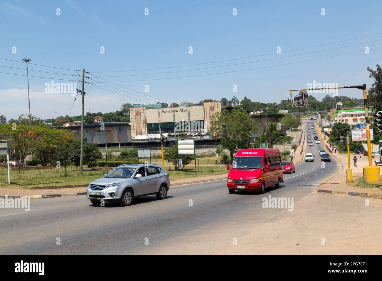 Cars travelling on a main road in downtown Manzini Stock Photo - Alamy