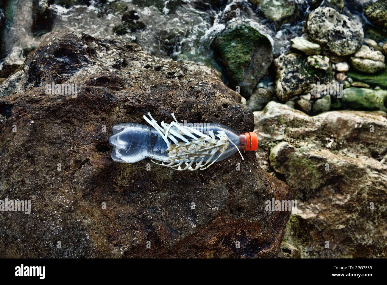 Plastic pollution of sea. Nature is fighting with garbage Stock Photo ...