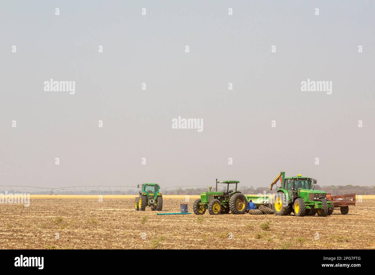 In-field repairs to a tractor on one of the large Pandamatenga farms ...