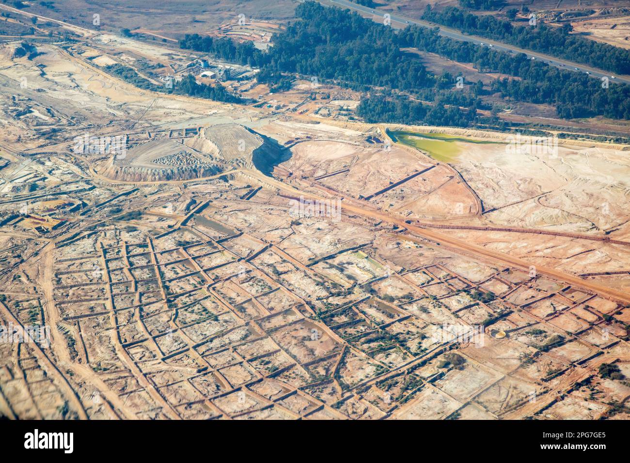 Aerial view of a gold mine dump bin the process of being re-worked to ...