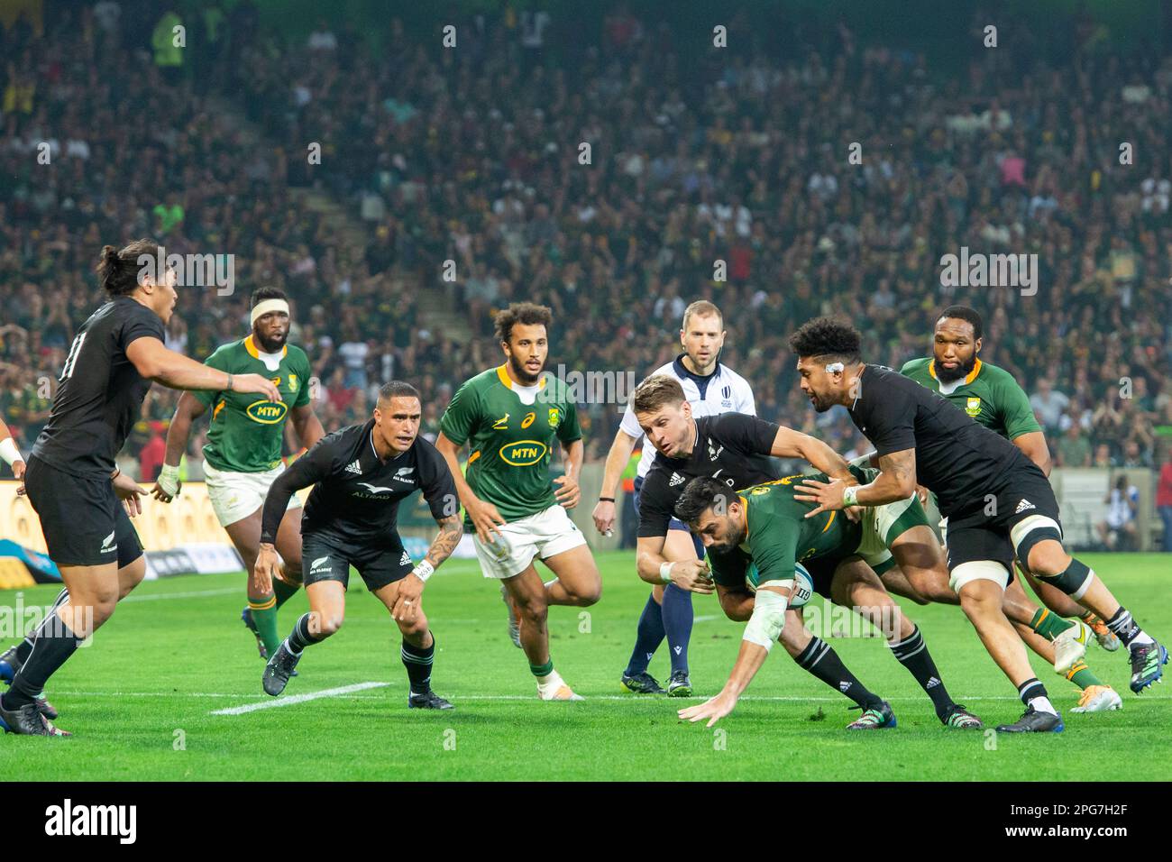 Isolated Springbok Damian de Allende surrounded by All Blacks. 6 August ...