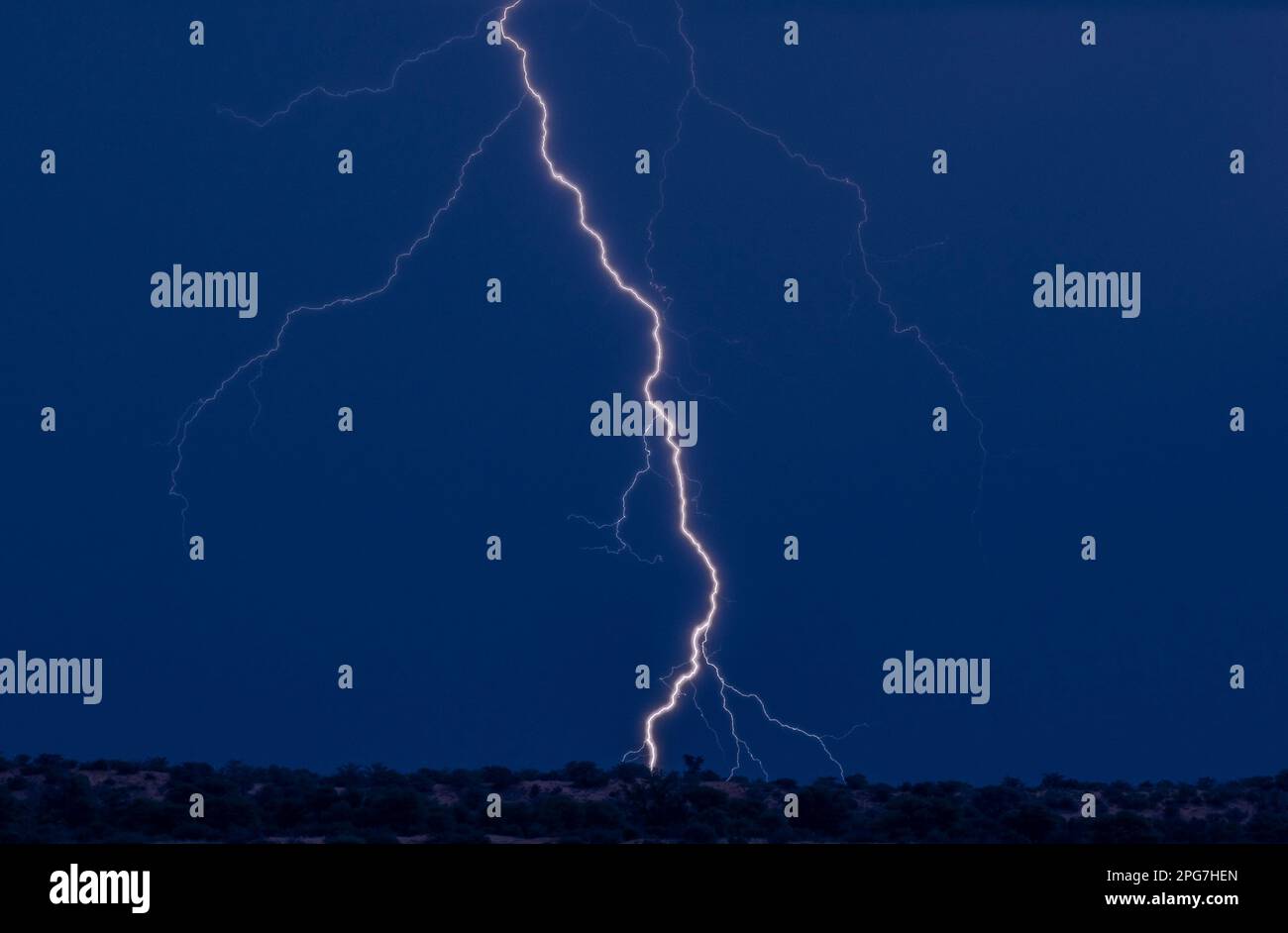 Lightning strike on a hillside in the Kgalagadi Stock Photo - Alamy