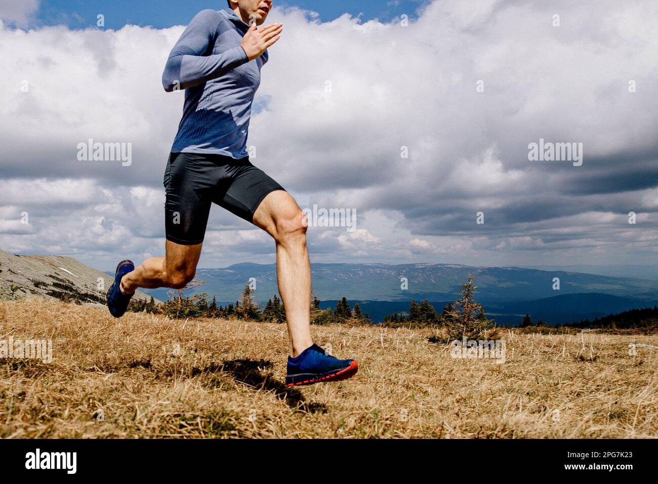 close up male runner running on mountain trai, competition race, sports ...