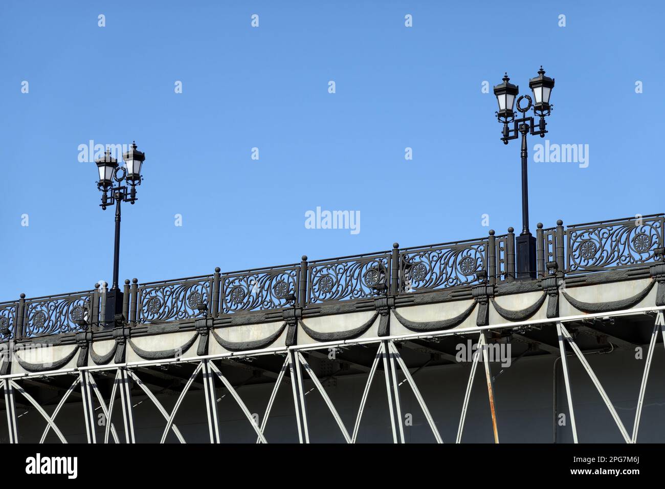 Part of Patriarchal Bridge in Moscow with vintage lanterns and openwork ...