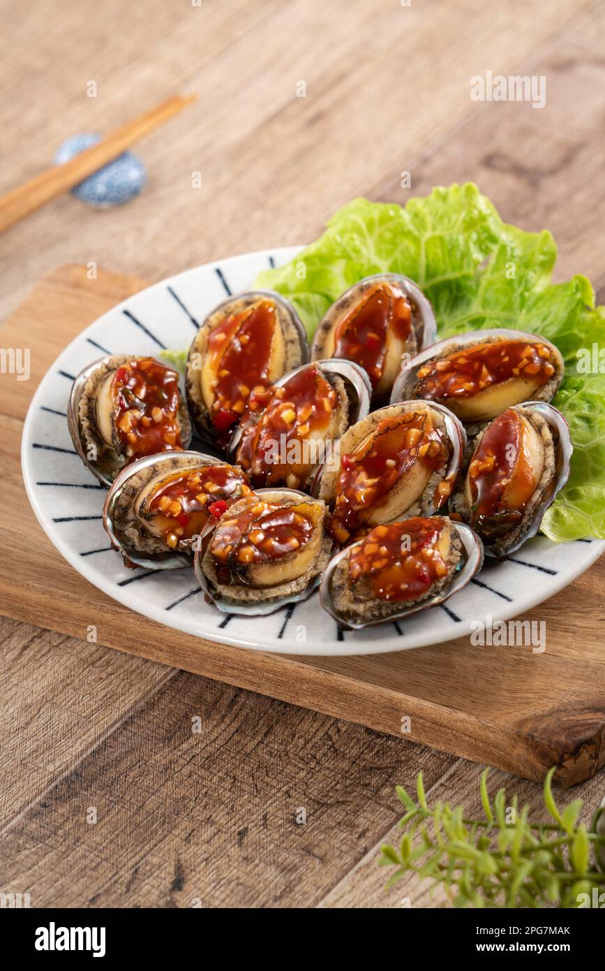 Delicious steamed abalone with spicy tomato sauce, Taiwanese five ...