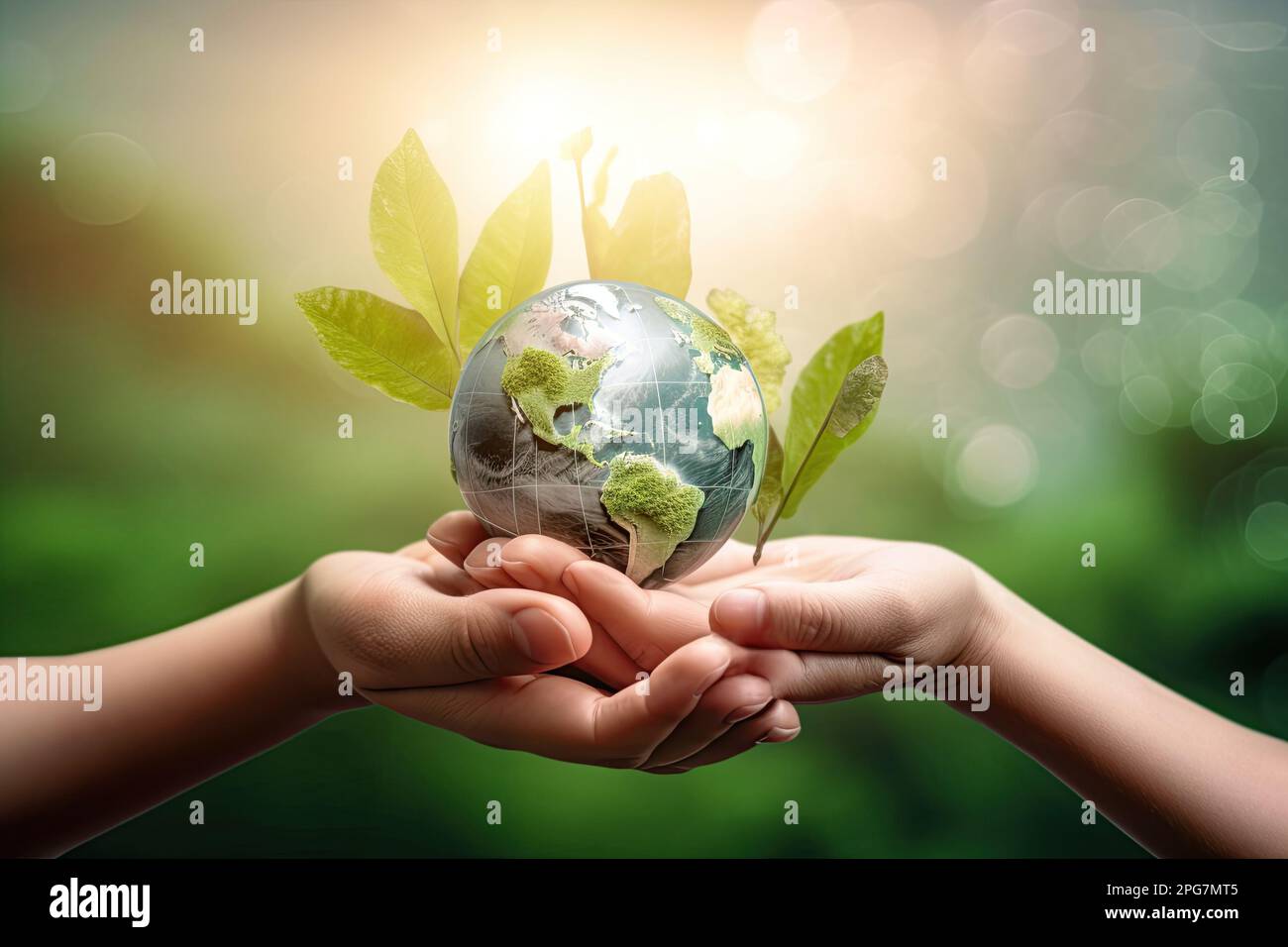 Two human hands holding a small globe of planet earth with a young ...