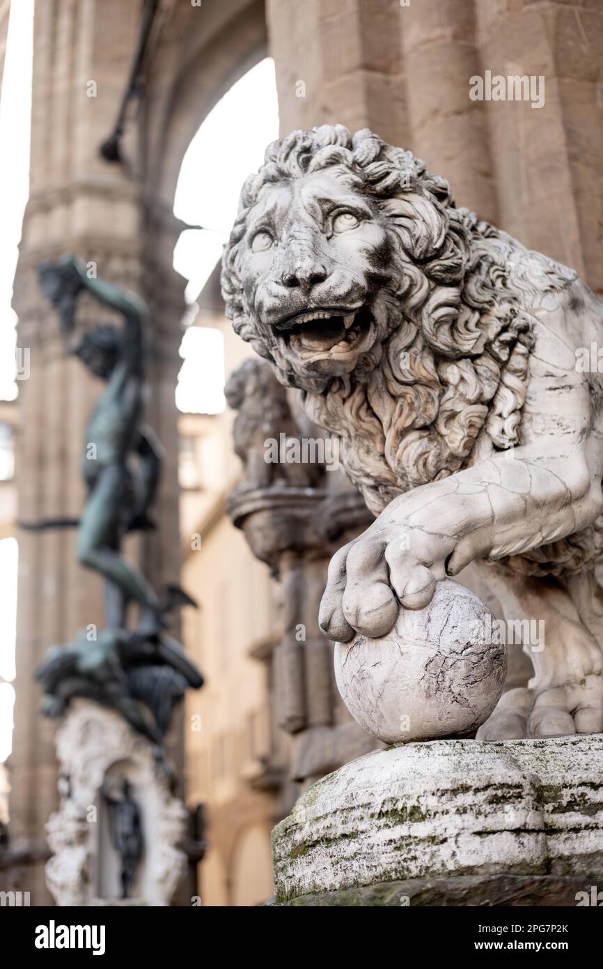 One of the Medici lions flanking the steps into the Loggia della ...