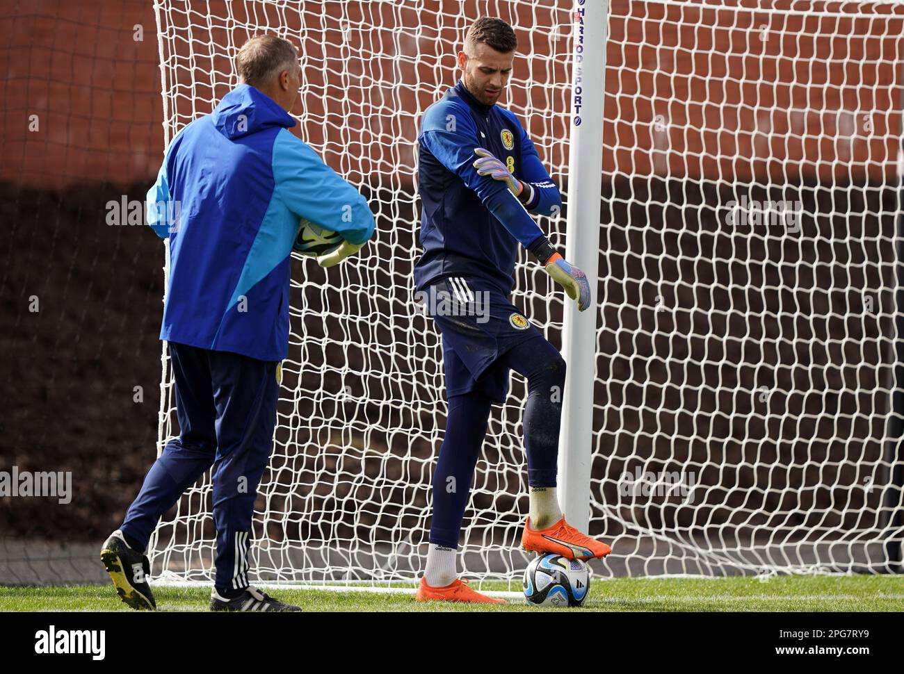 Scotland goalkeeper Angus Gunn (right) during the training session at ...