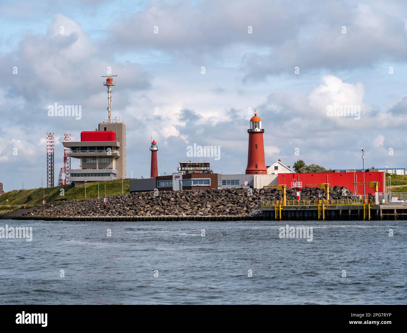 Harbour entrance IJmuiden with port control tower and two lighthouses ...