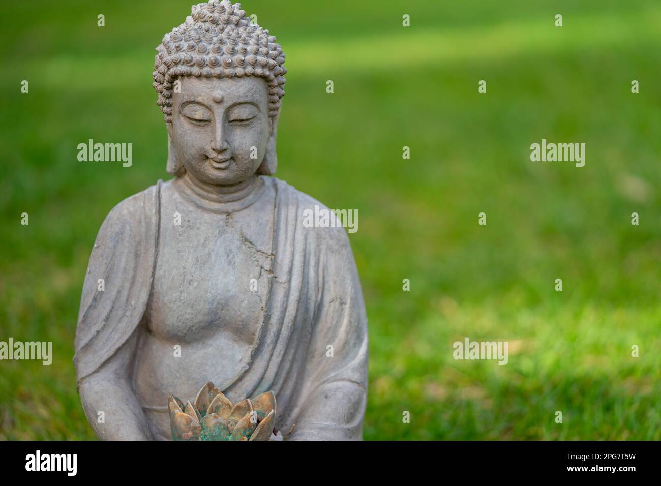 buddha statue in the garden Stock Photo - Alamy