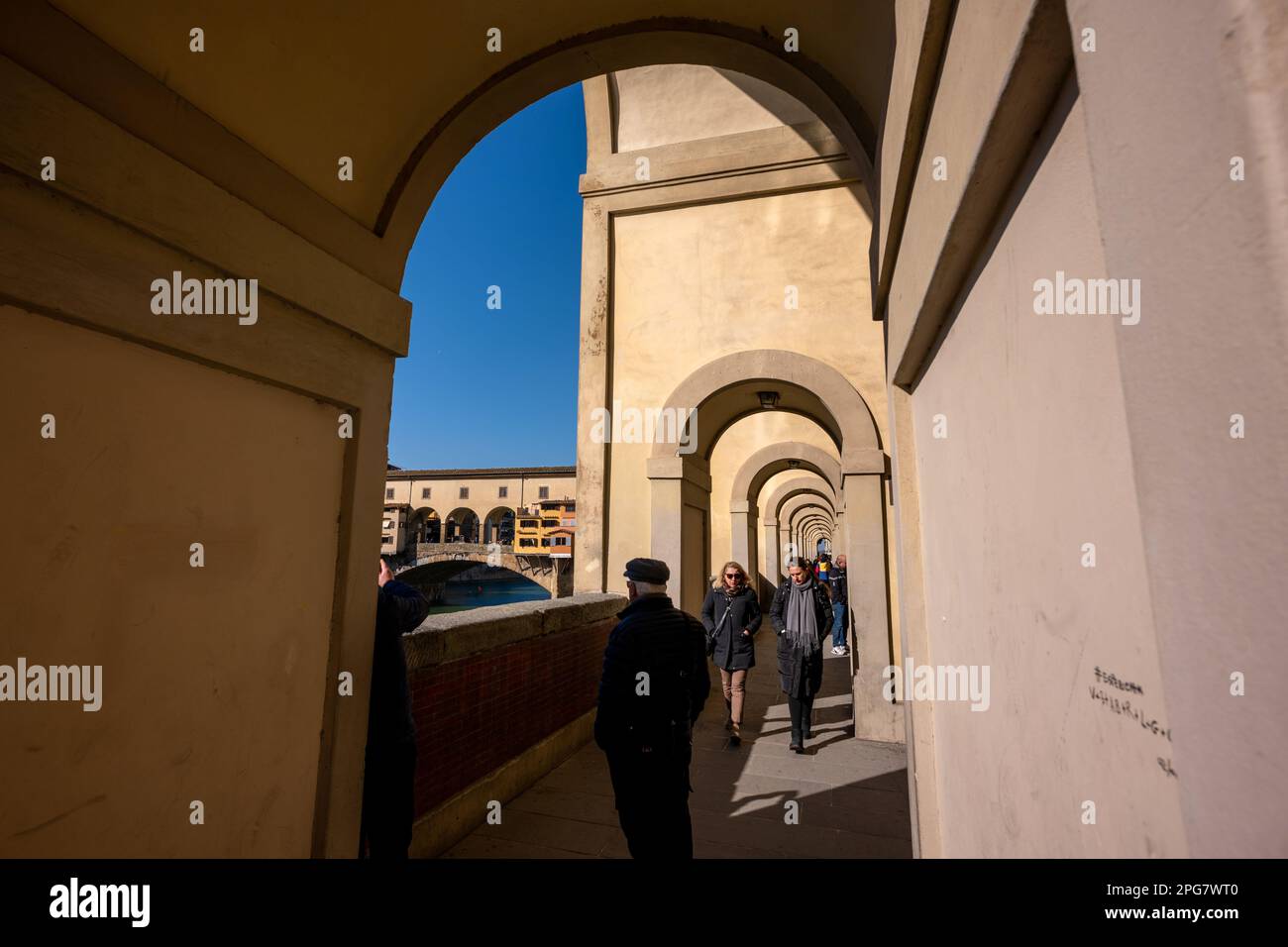 The famous Ponte Vecchio bridge in Florence with the Vasari corridor ...