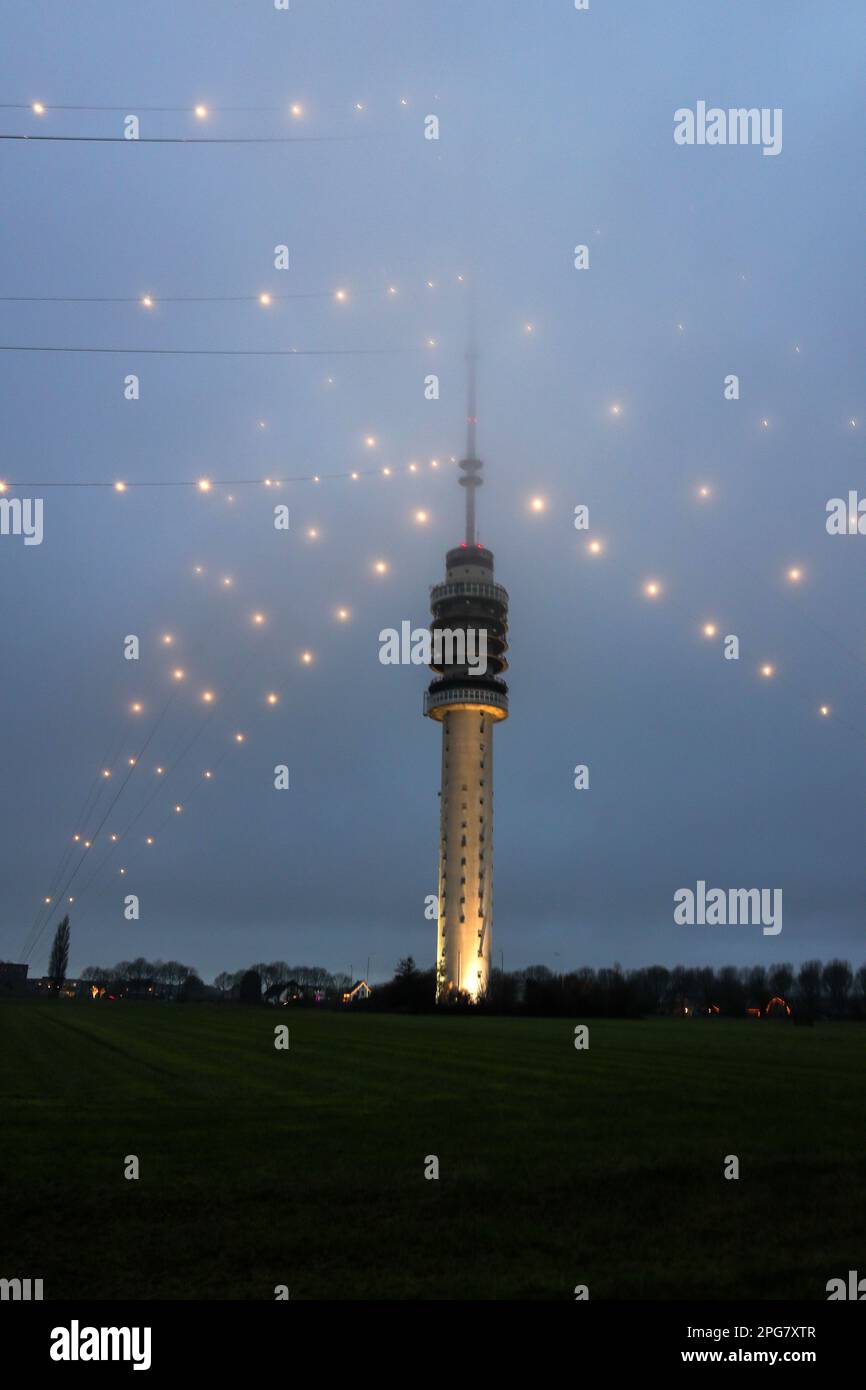 Radio and TV antenna Gerbrandytoren with lights on the guy wires that ...