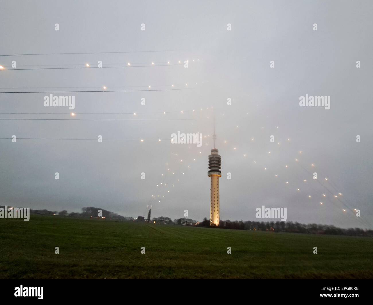 Radio and TV antenna Gerbrandytoren with lights on the guy wires that ...