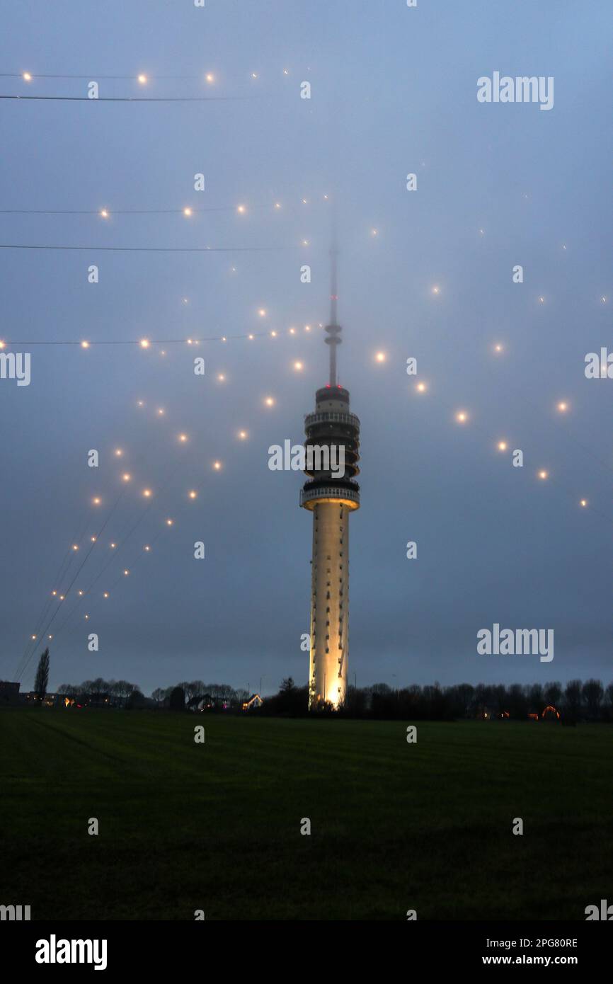 Radio and TV antenna Gerbrandytoren with lights on the guy wires that ...