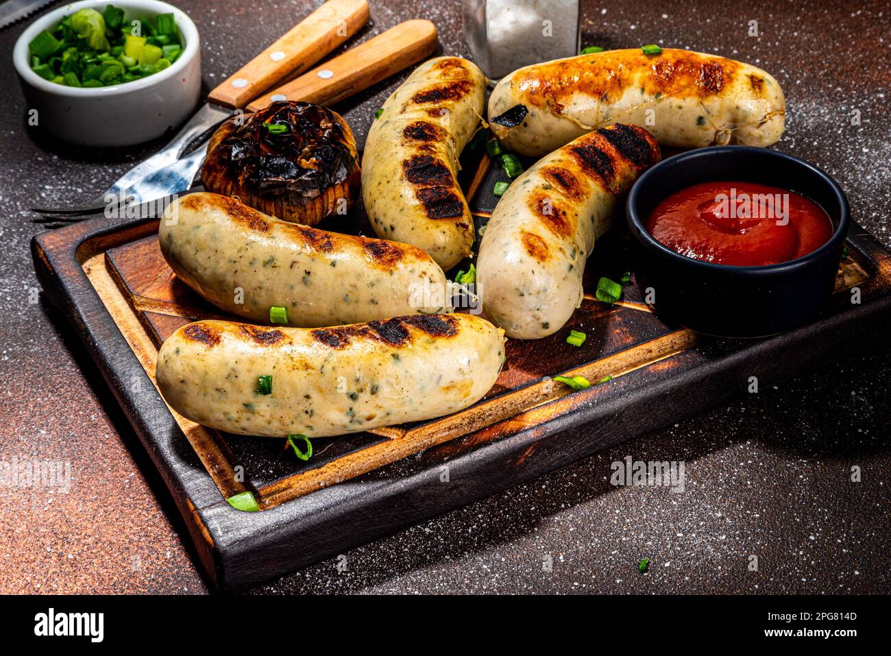 Grilled white chicken, pork meat sausages, ready bbq Munich, Greisinger ...