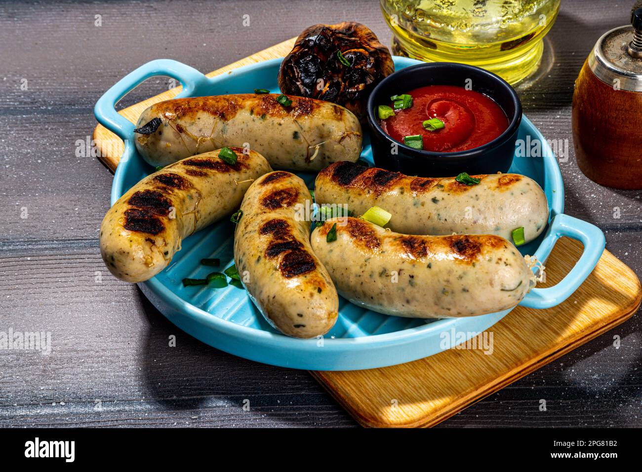 Grilled white chicken, pork meat sausages, ready bbq Munich, Greisinger ...