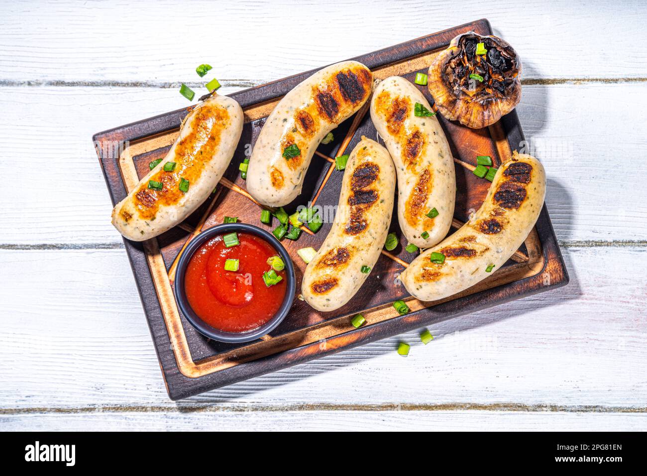 Grilled white chicken, pork meat sausages, ready bbq Munich, Greisinger ...