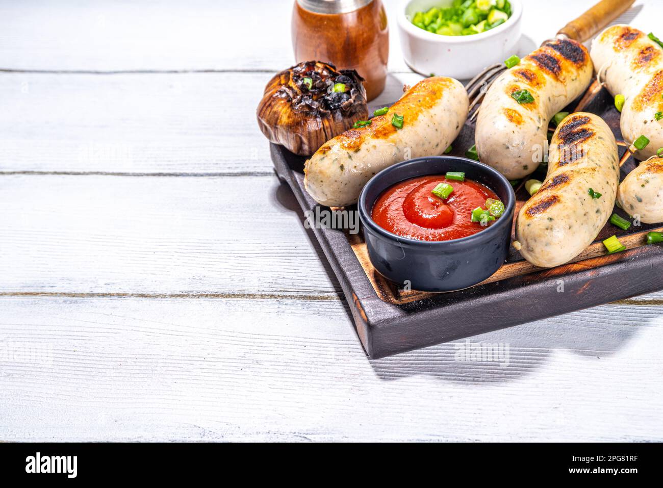 Grilled white chicken, pork meat sausages, ready bbq Munich, Greisinger ...