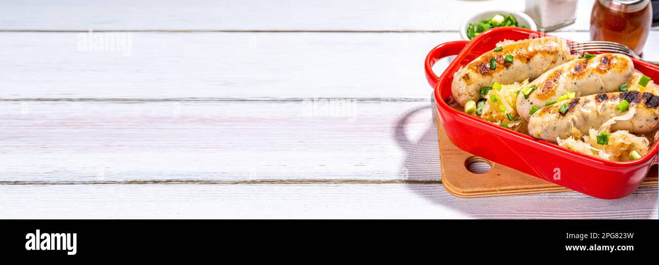 White fried Munich, wurst sausages with fried cabbage or sauerkraut ...