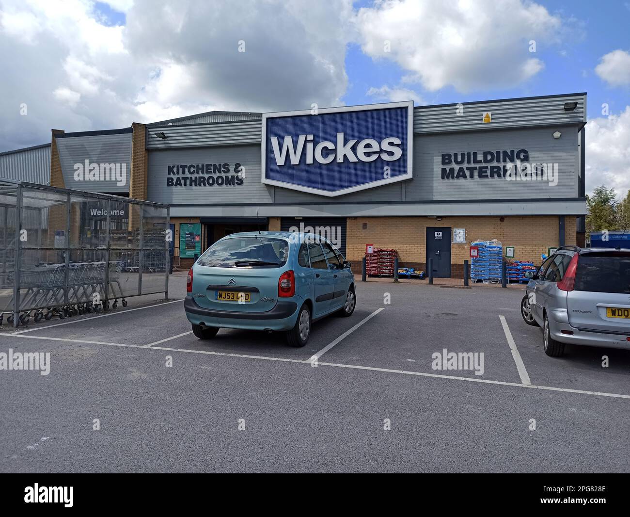 The two cars lined up in the parking lot of the Wickes store in Yeovil ...