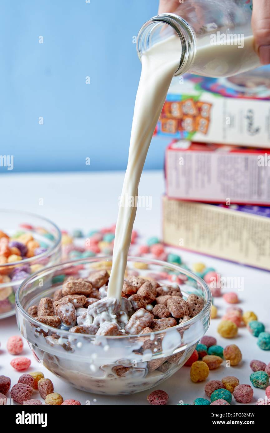 Milk pouring bowl cereals hi-res stock photography and images - Alamy