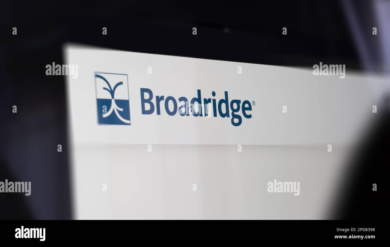 March 2023. The Broadridge logo on a wall of screens Stock Photo - Alamy