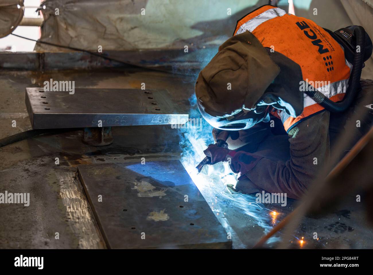 Duisburg, Germany. 21st Mar, 2023. A construction worker works on the ...
