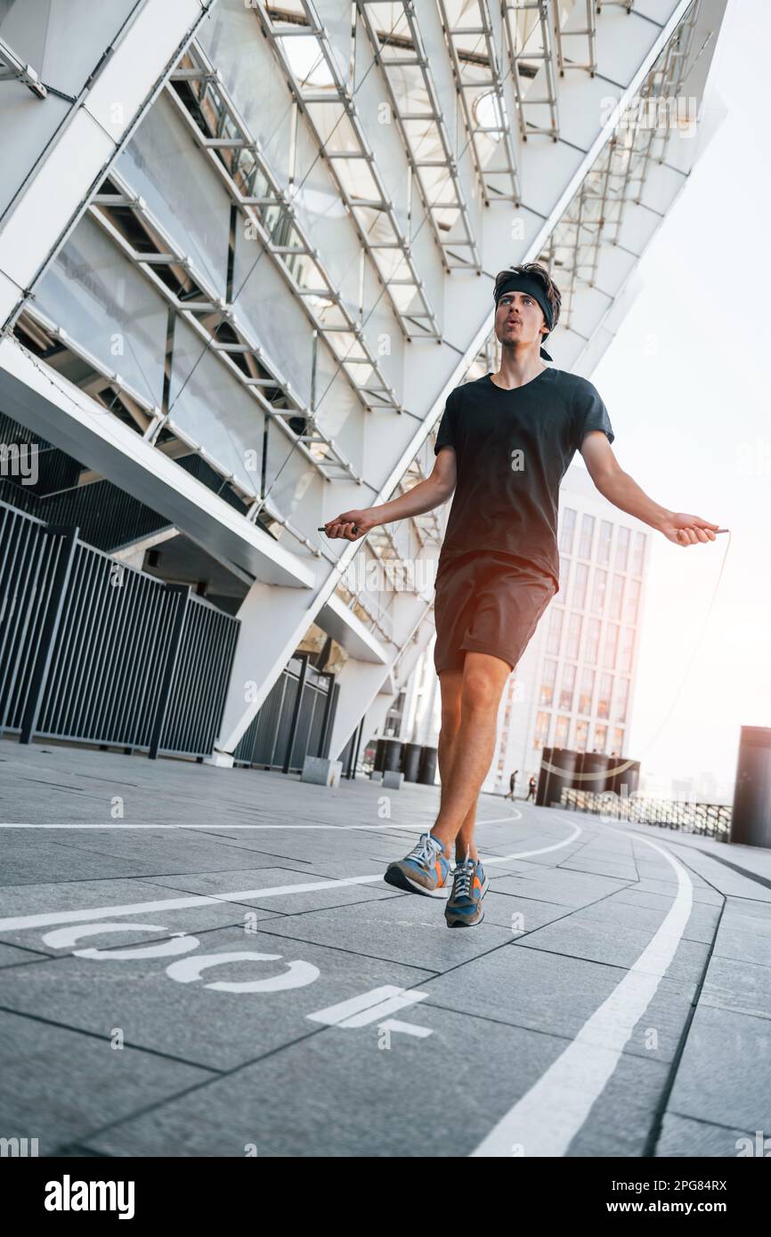 Young sportive man jumping hi-res stock photography and images - Alamy