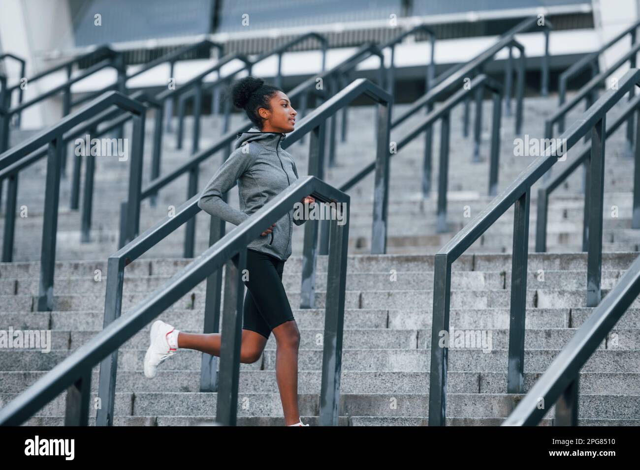 Active runner. Young african american woman in sportive clothes have ...