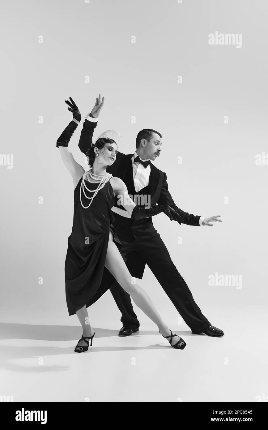 Adorable passionate couple of dancers dancing tango. Man and woman in ...