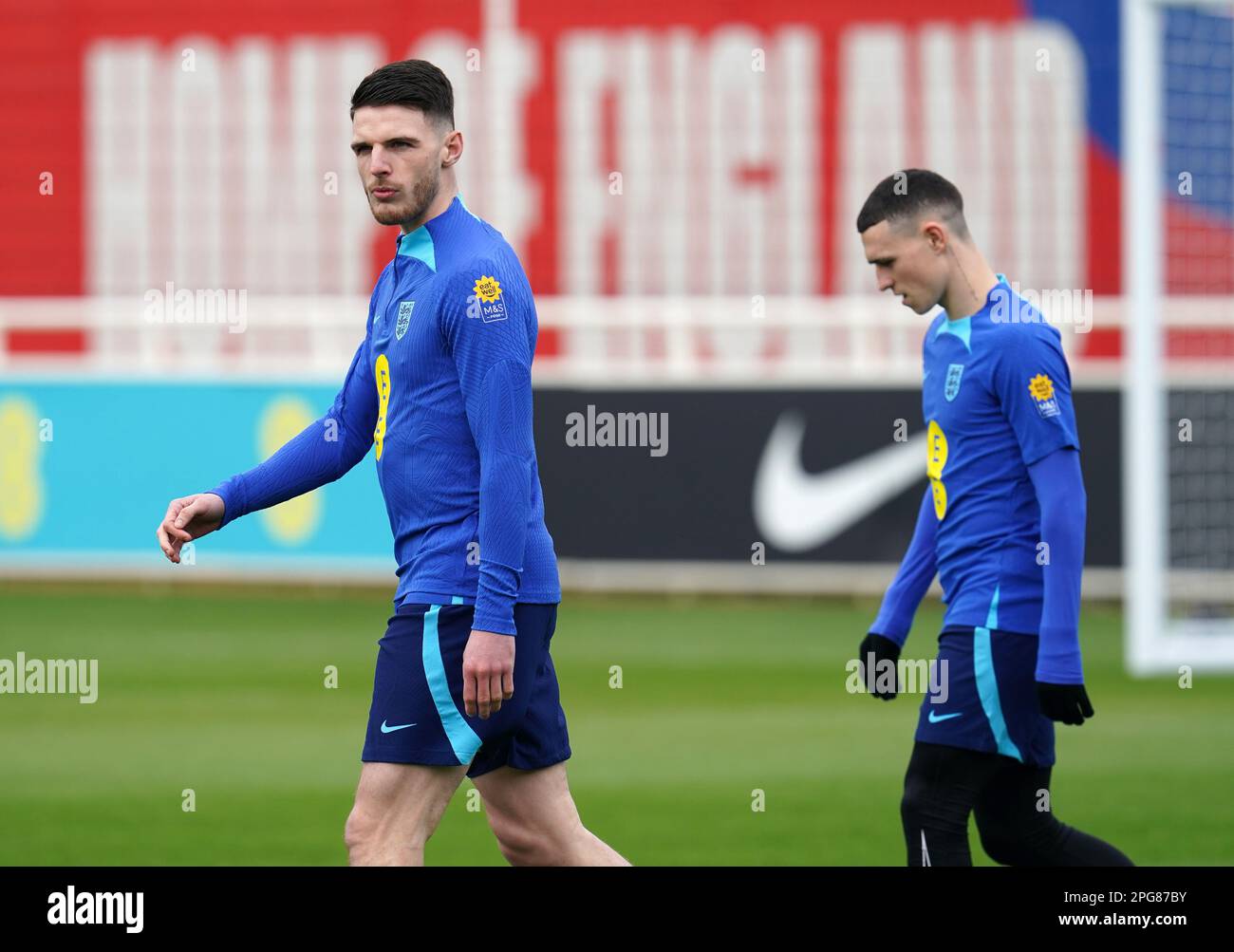 England's Declan Rice and Phil Foden during a training session at St ...