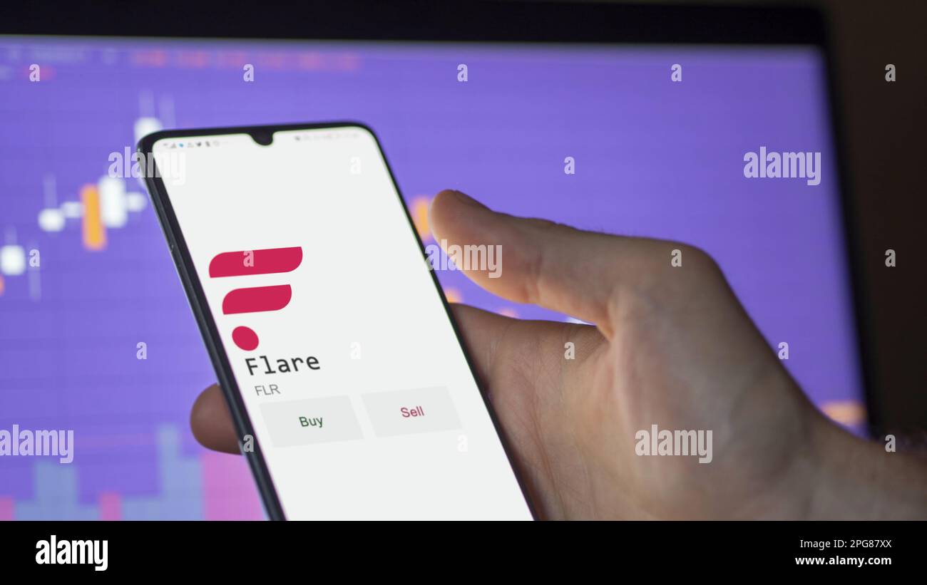 March 11 2023 London UK. An investor's analyzing the Flare coin on ...