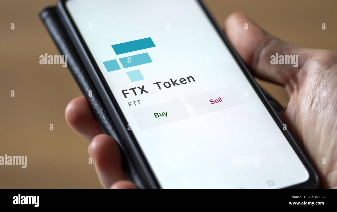 March 11 2023 London UK. An investor's analyzing the FTX Token coin on ...