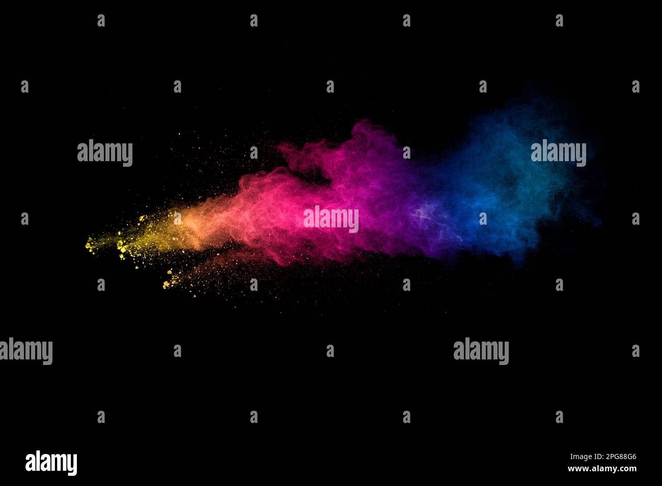Abstract multi color powder explosion on black background. Freeze ...