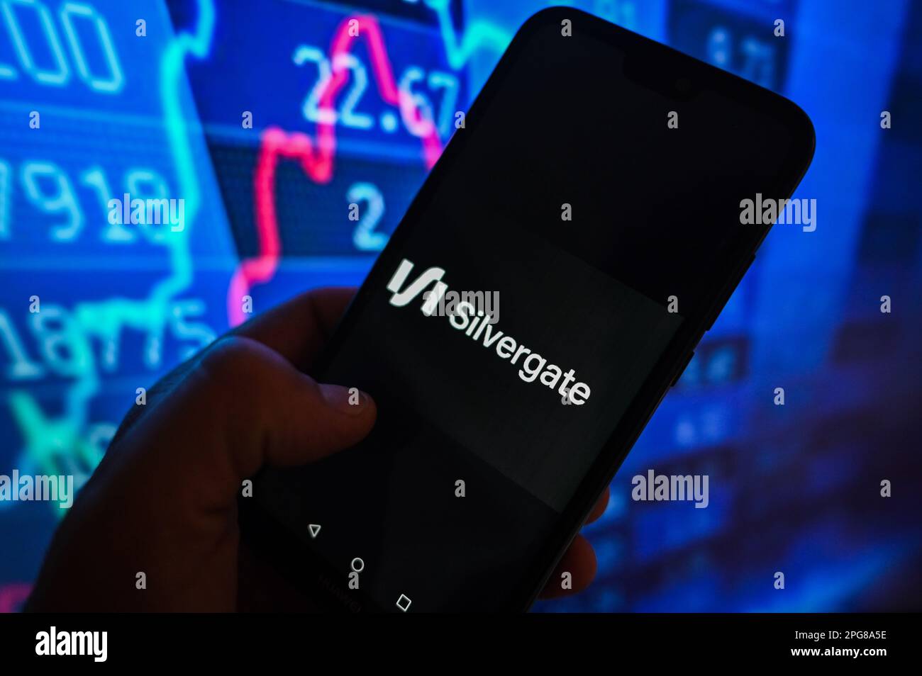 In this photo illustration, a Silvergate logo is displayed on a ...