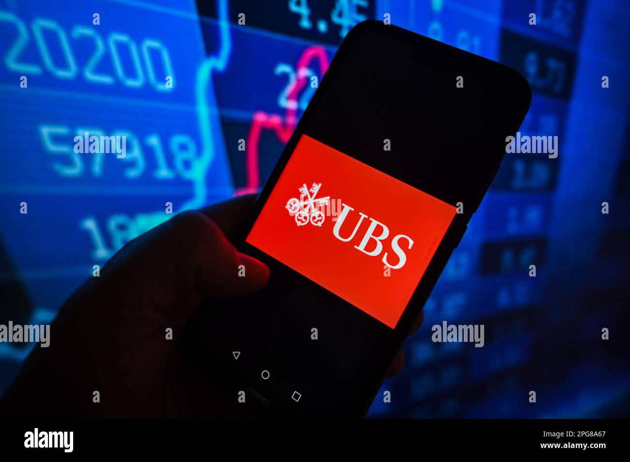 In this photo illustration, a UBS logo is displayed on a smartphone ...