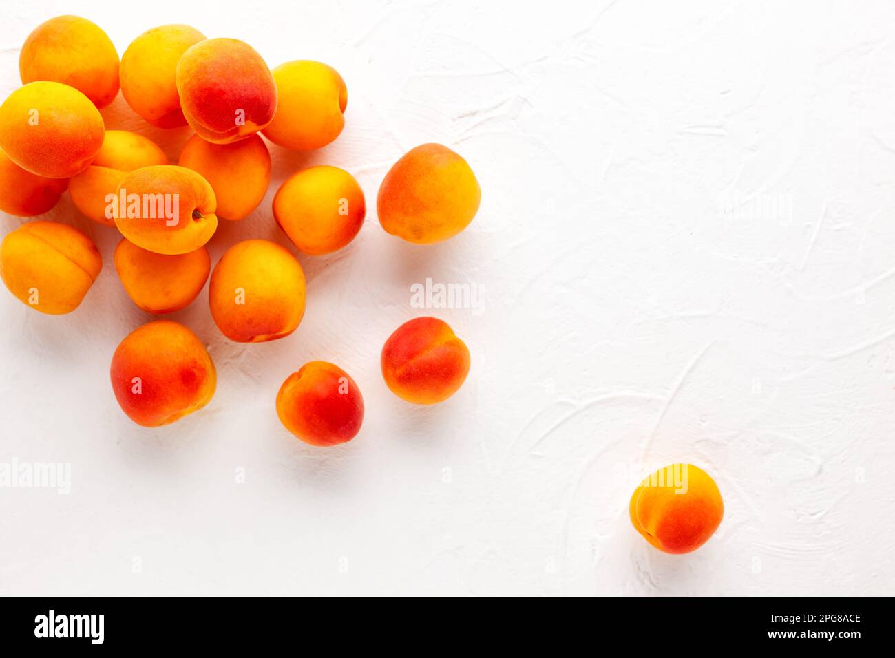 Fresh organic apricots on white background. Vegetarian, clean and ...
