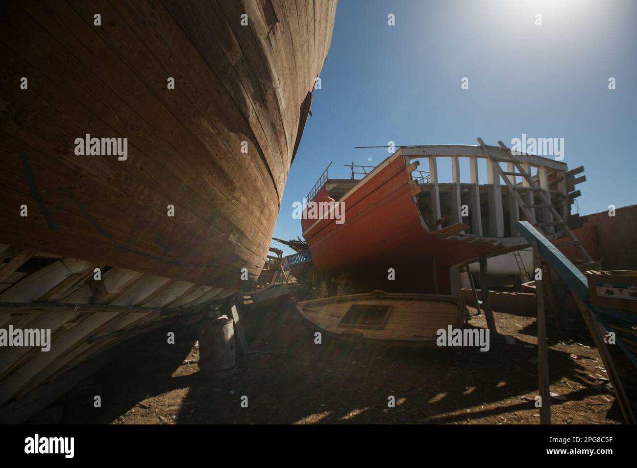 Fishing boats are in the process of being built and assembled in the ...