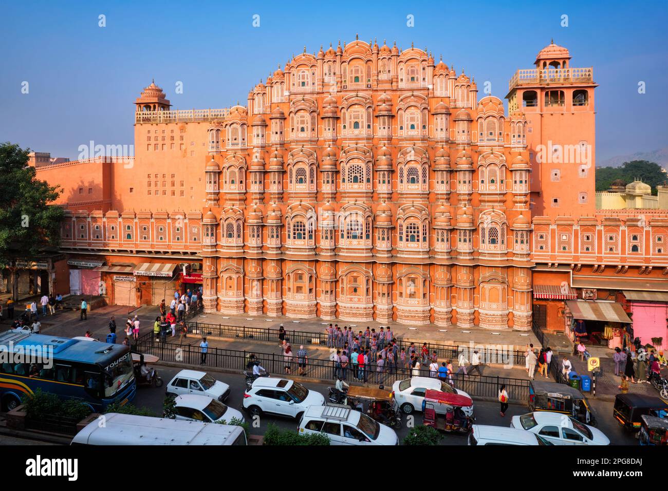 Famous historical landmak pink Hawa Mahal Palace of Winds with people ...