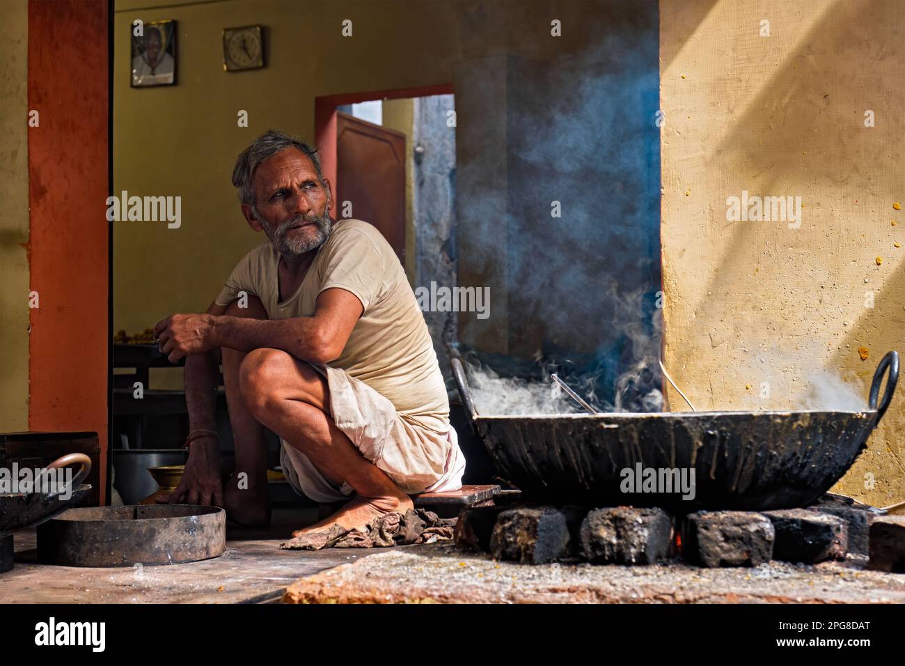Street food stall cook cooking sweets Stock Photo - Alamy