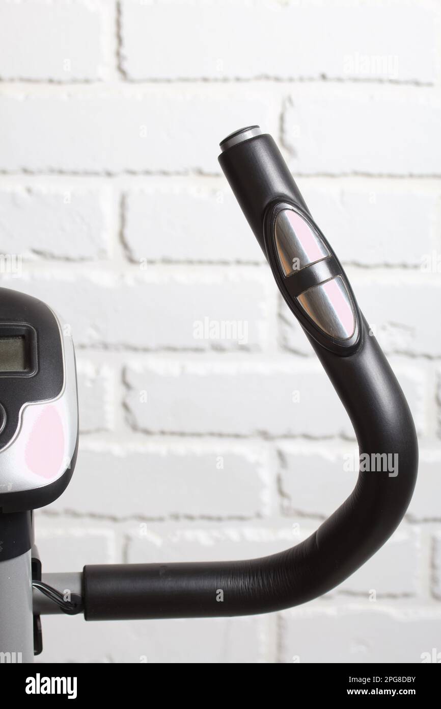 Elements of an exercise bike. Steering wheel sensors and display ...