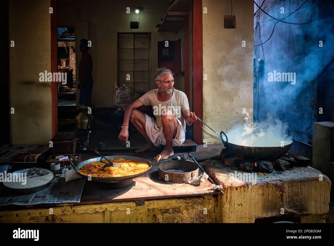 Indian men at milk market hi-res stock photography and images - Alamy