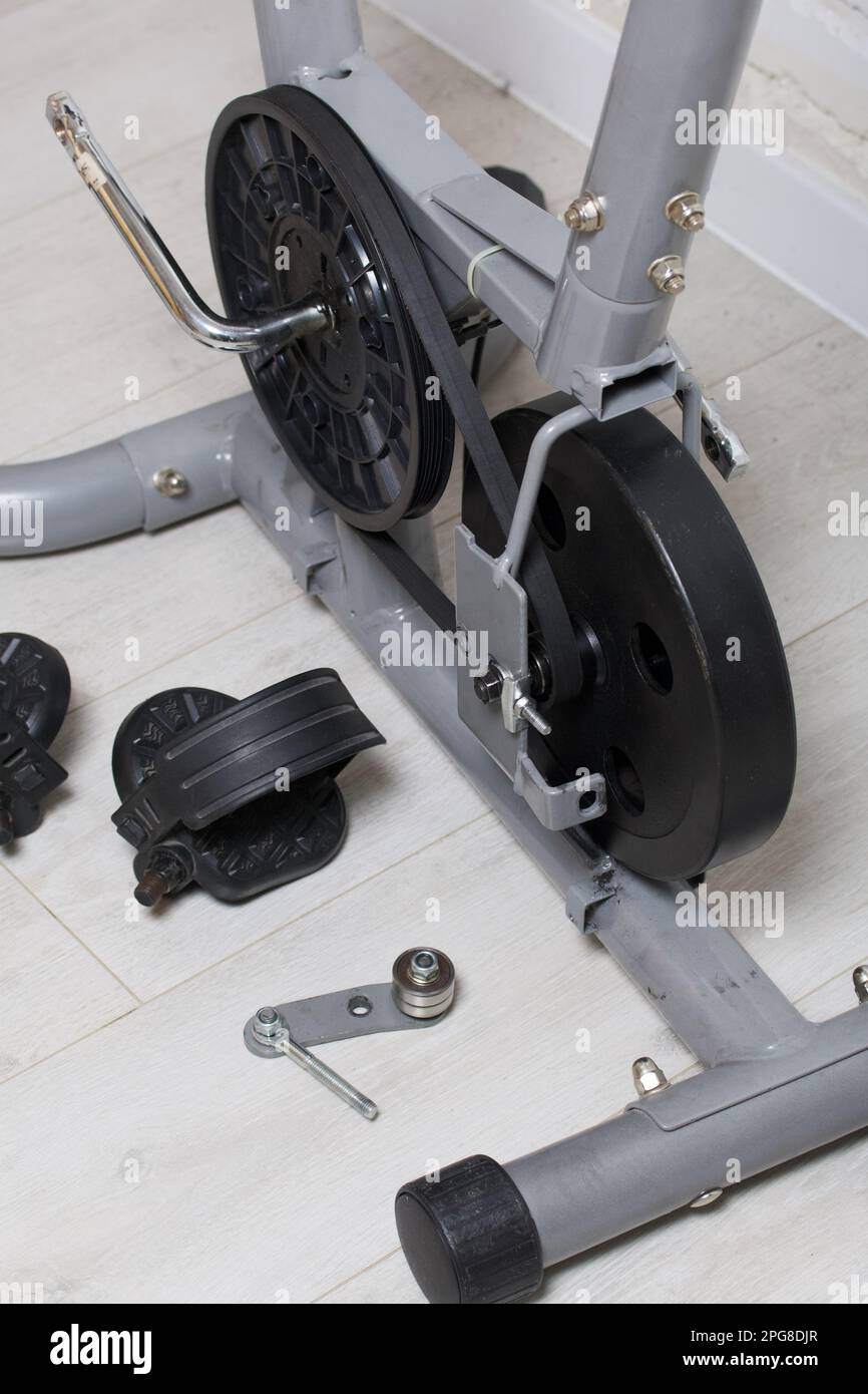 Elements of an exercise bike. Servicing the drive pulley and flywheel ...