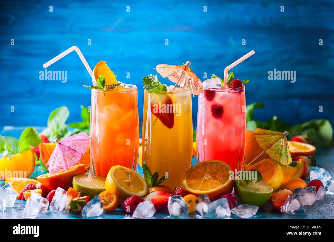Different types of summer drinks in glasses, cubes of ice and slice of ...
