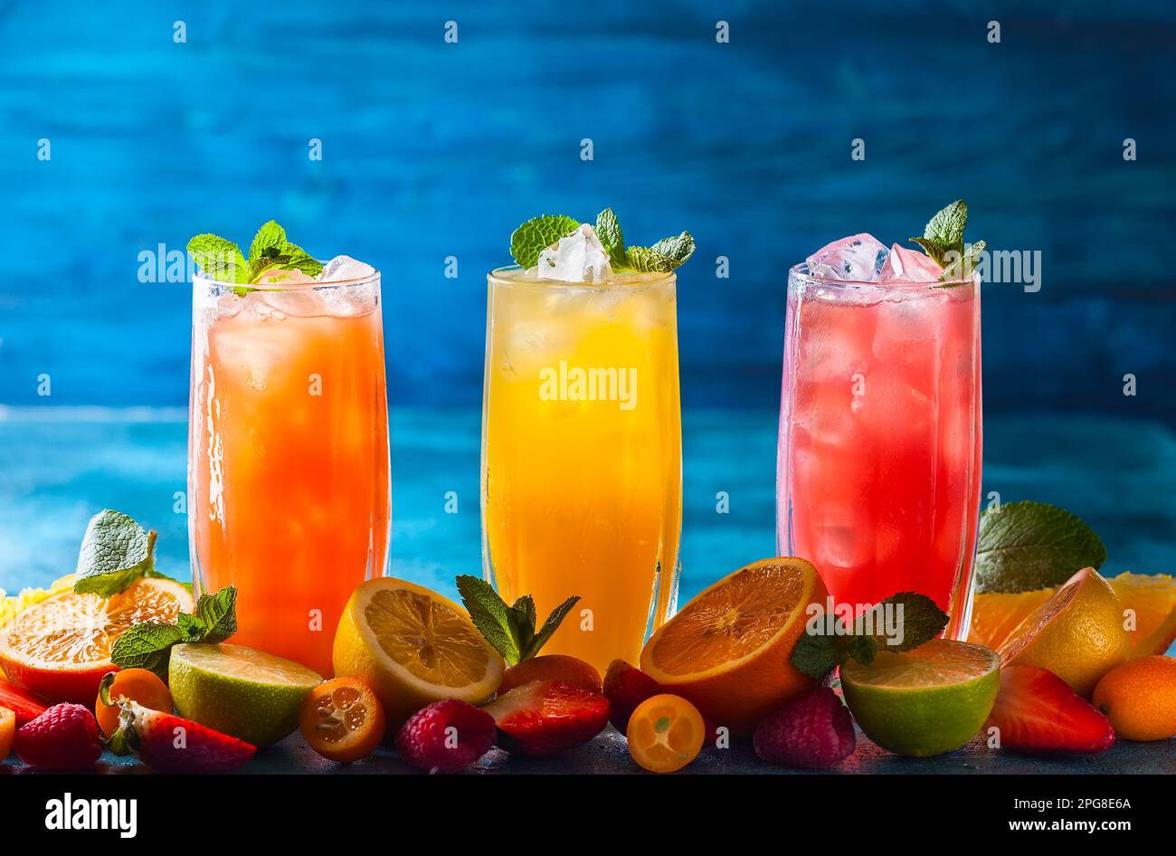 Different types of summer drinks in glasses, cubes of ice and slice of ...