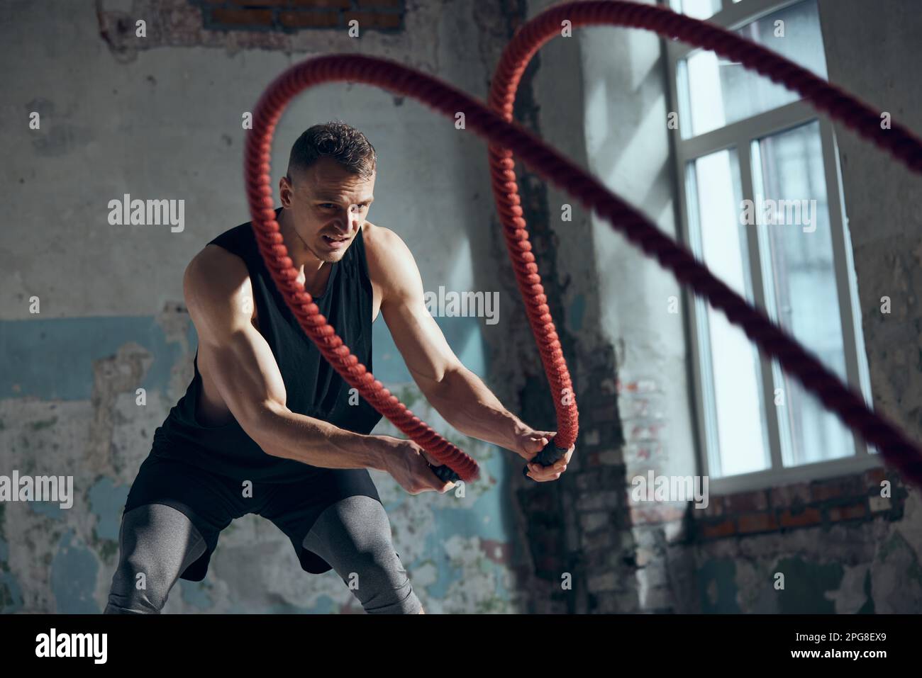 Competition preparation. Portrait of young sportive man with strong ...