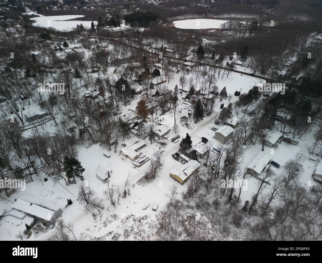 Aerial photograph of residential buildings surrounded by snow-covered ...
