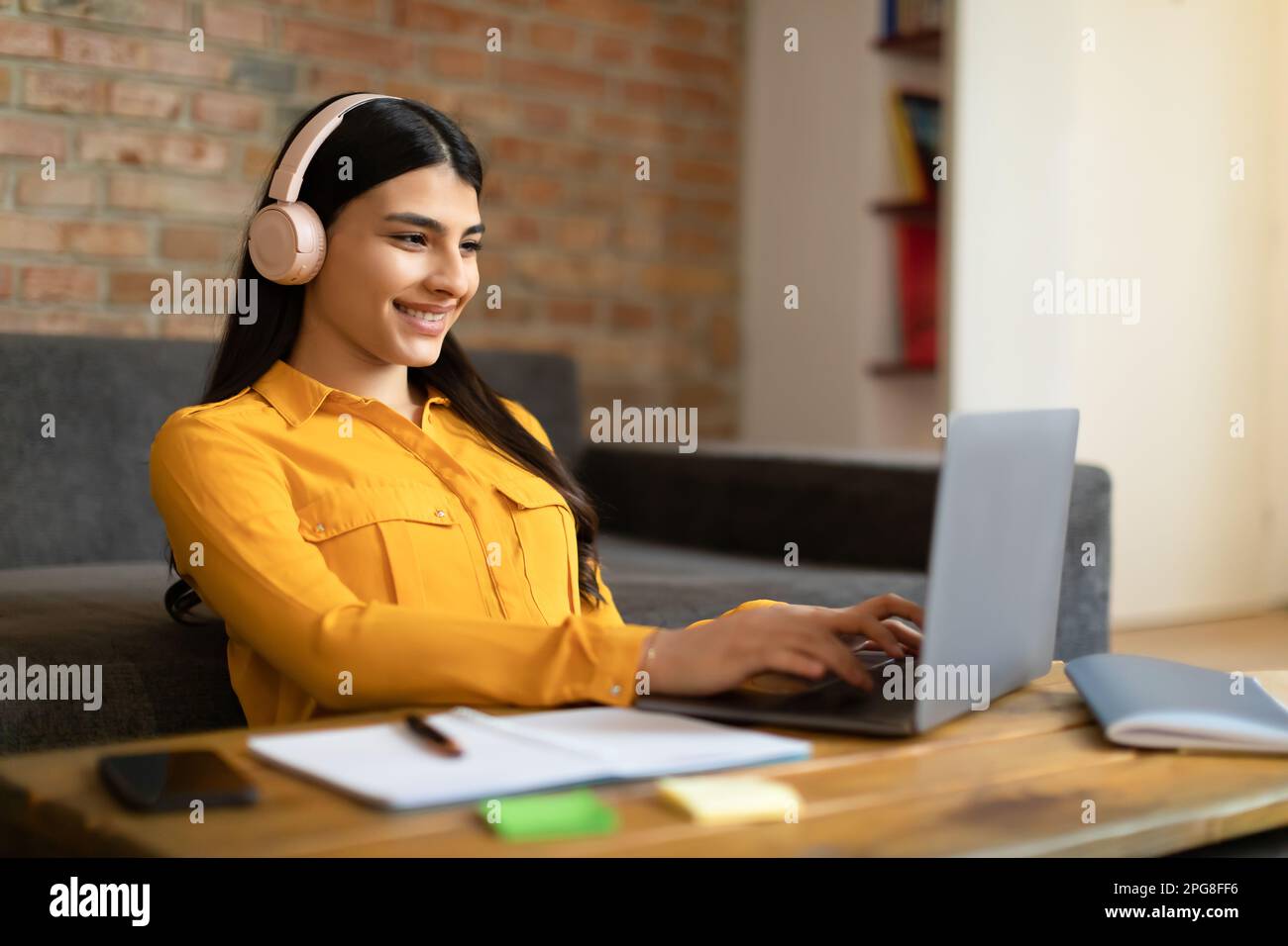 Smiling spanish woman watching hi-res stock photography and images - Alamy