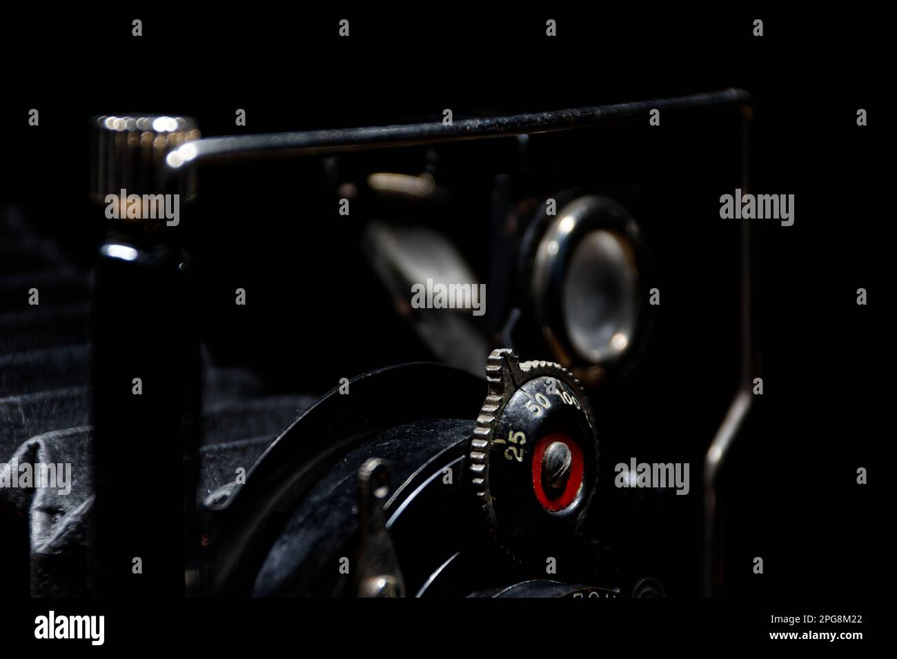 details of a vintage analog bellows camera with black background Stock ...