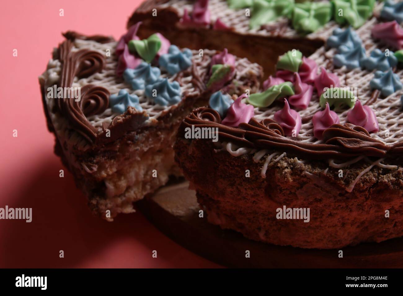 photo Kiev cake with a piece of it cut off, photo in a low key Stock ...